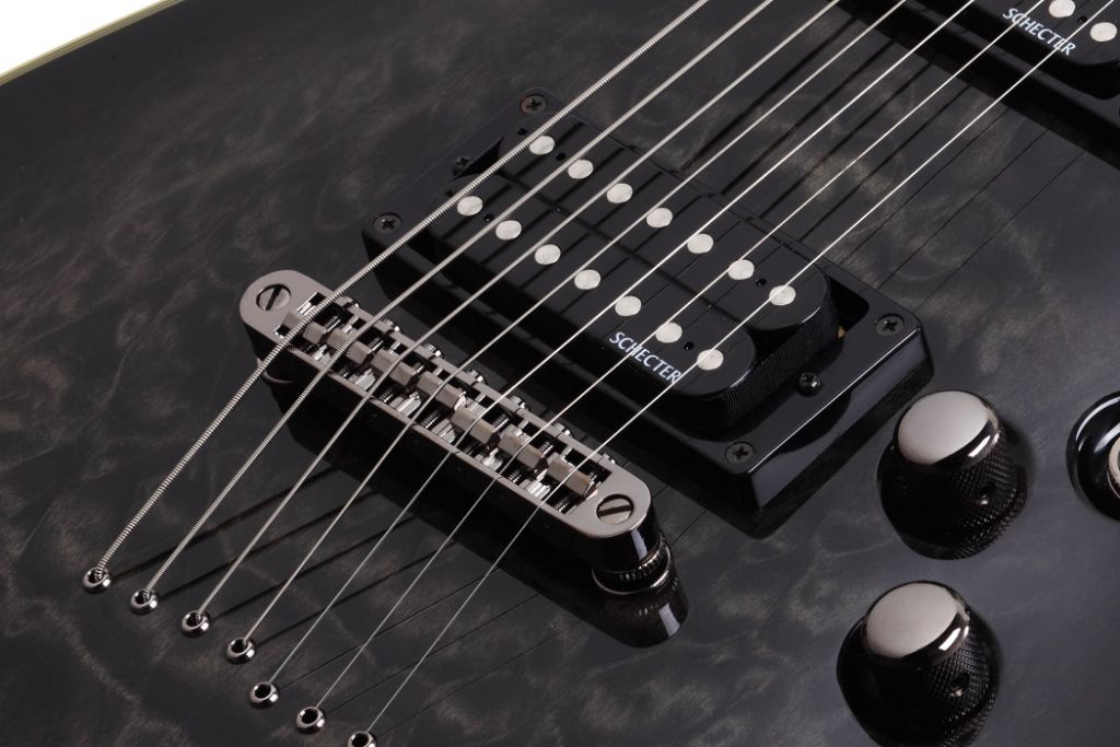 Schecter Omen Extreme-7 See Thru Black | Live Louder